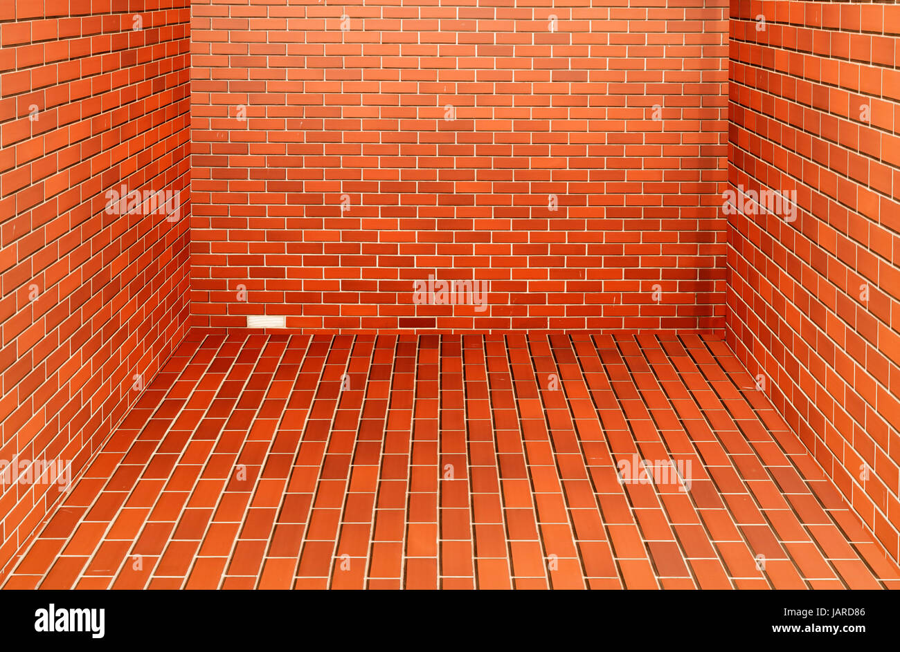 Room with red brick walls Stock Photo - Alamy