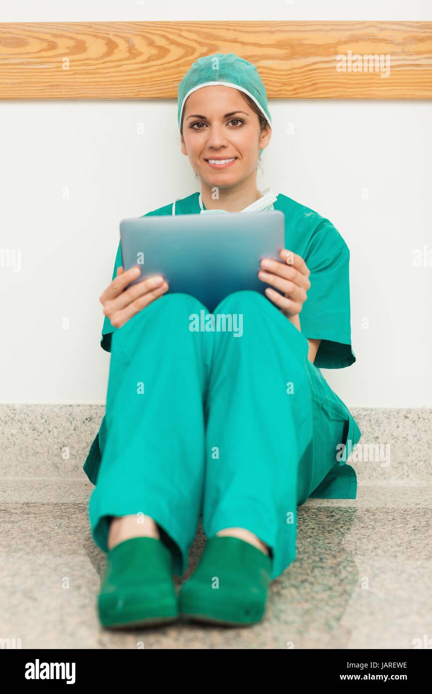 Woman smiling holding tactile hi-res stock photography and images - Alamy