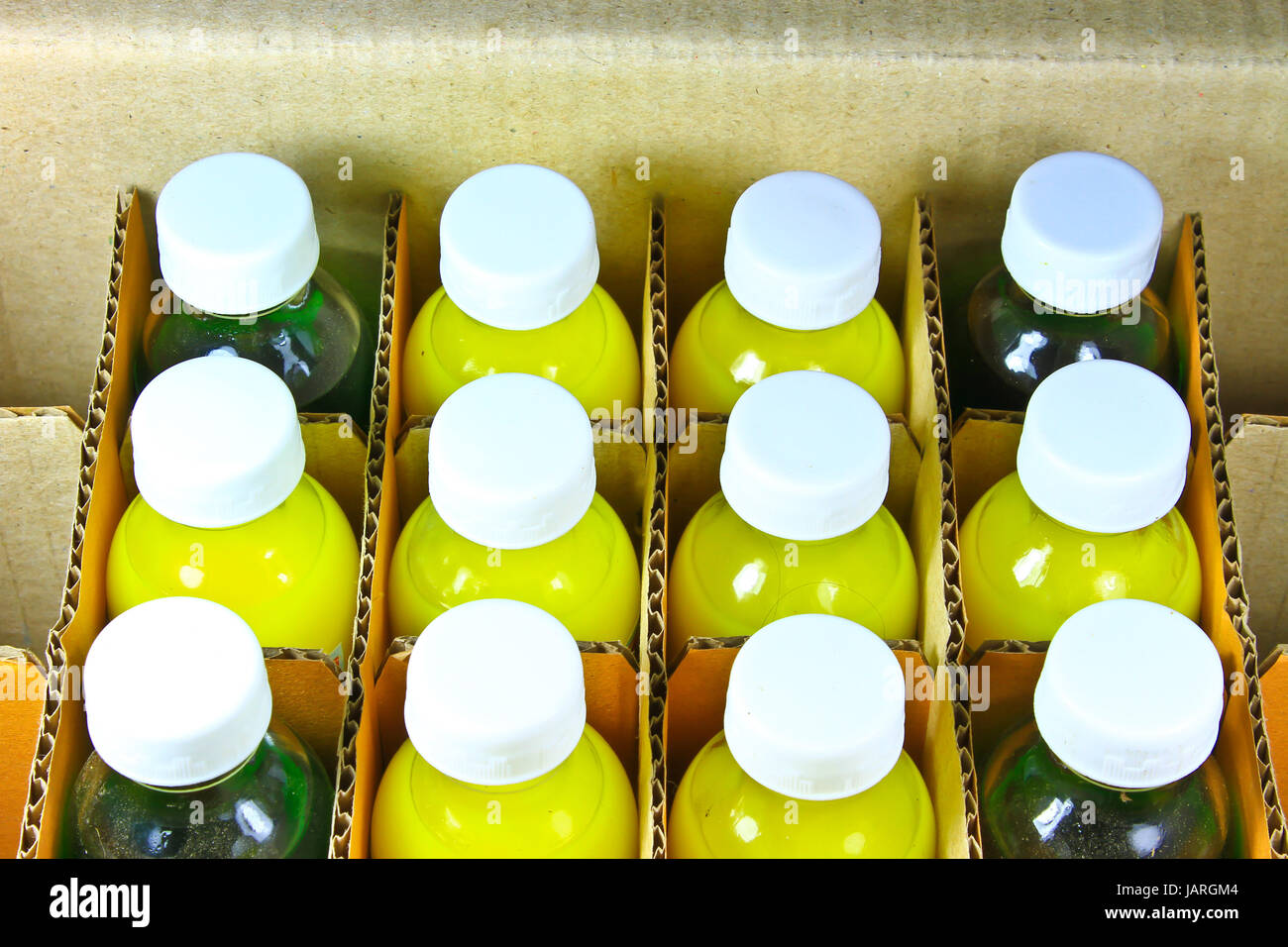 food coloring bottles in a cardboard box Stock Photo - Alamy