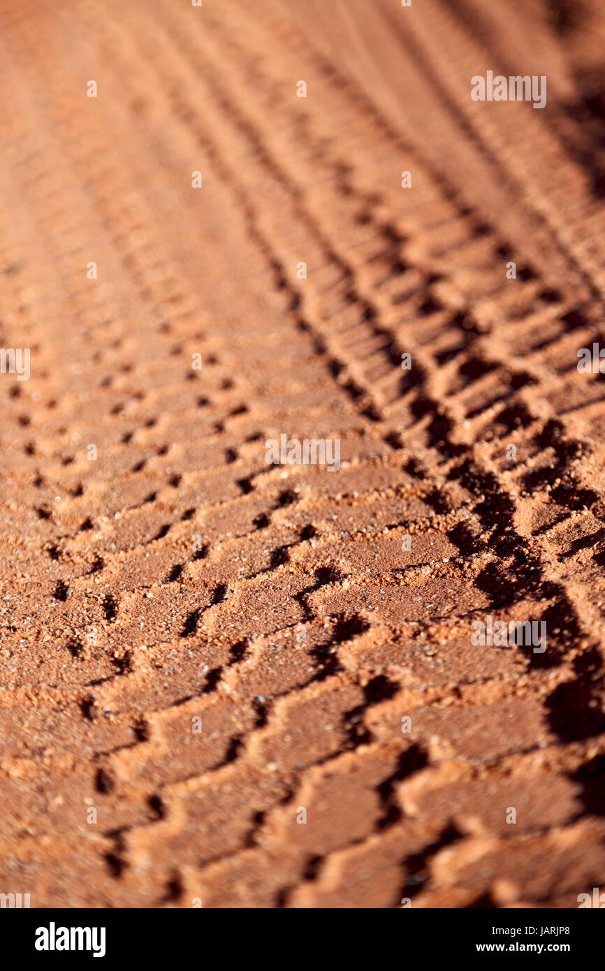 in the desert track of car and truck in the sand like abstract ...