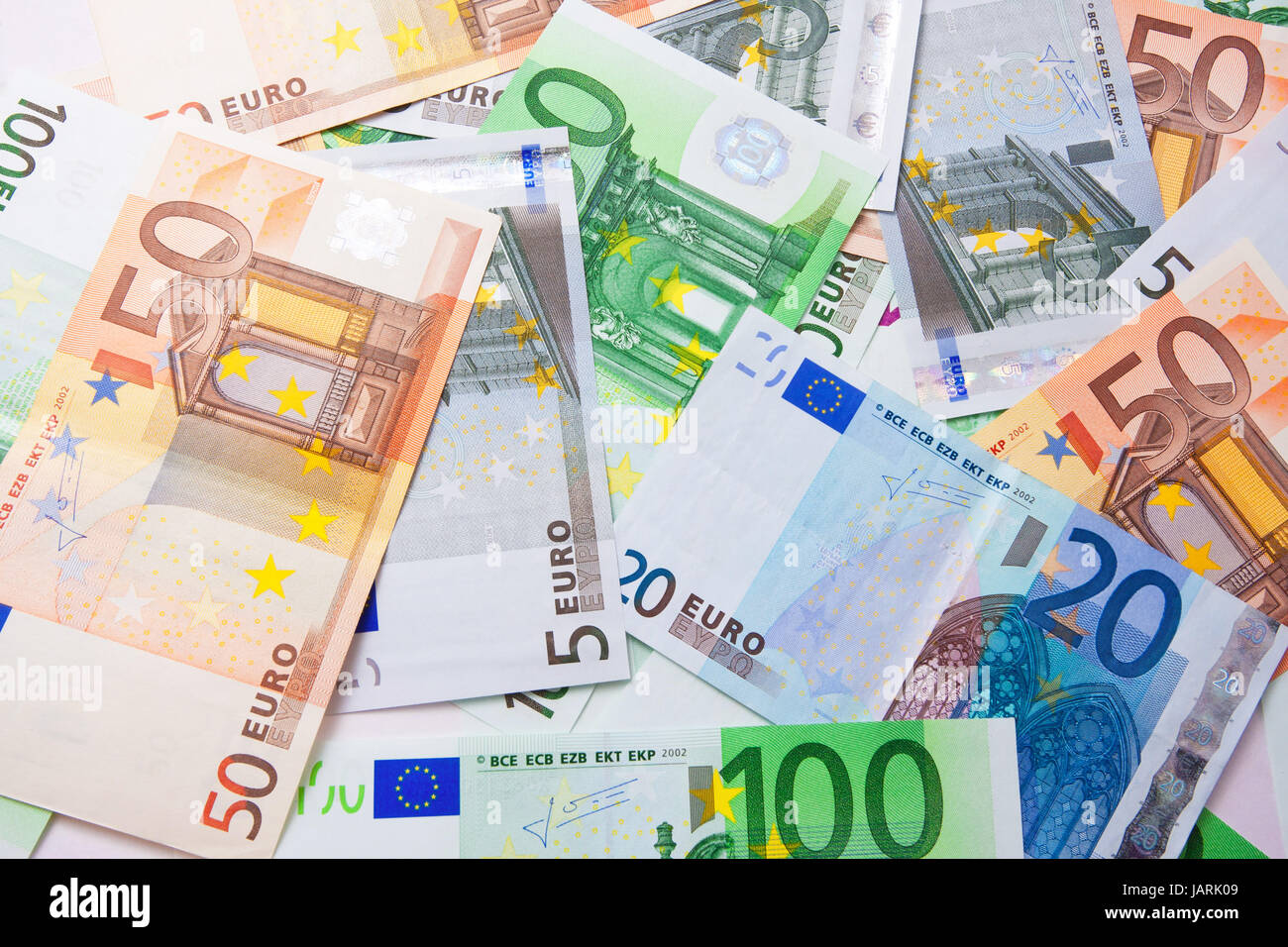Many euro banknotes making european currency background Stock Photo - Alamy