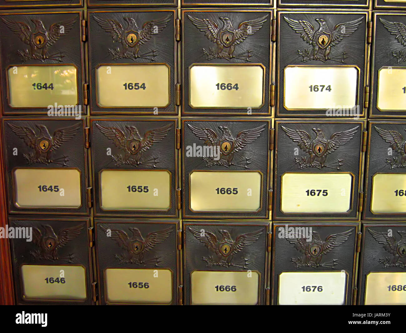 A photograph of mailboxes located inside a post office Stock Photo - Alamy