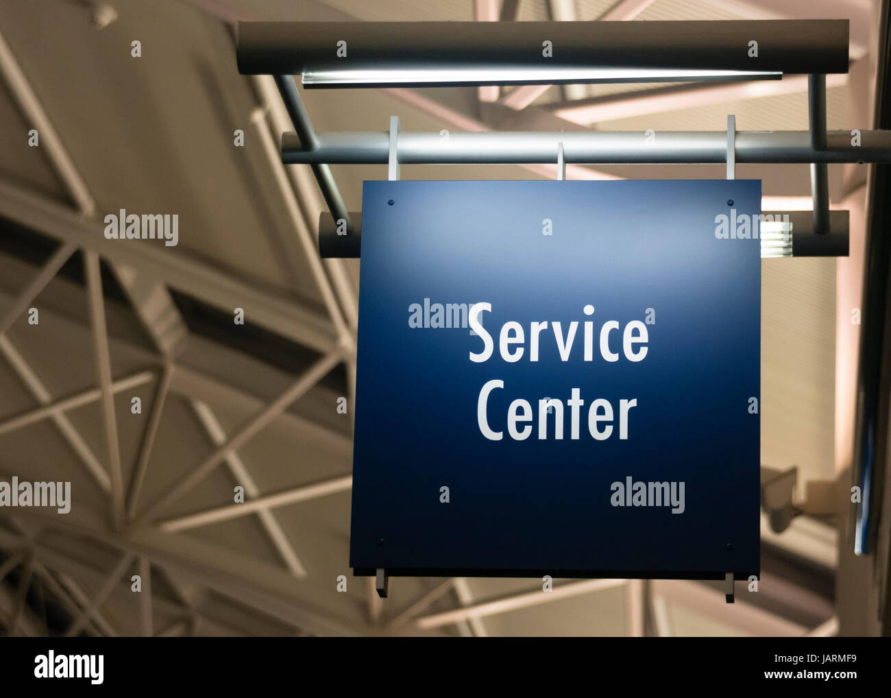 Blue Signage Marks the Customer Service Center in a Public Building ...