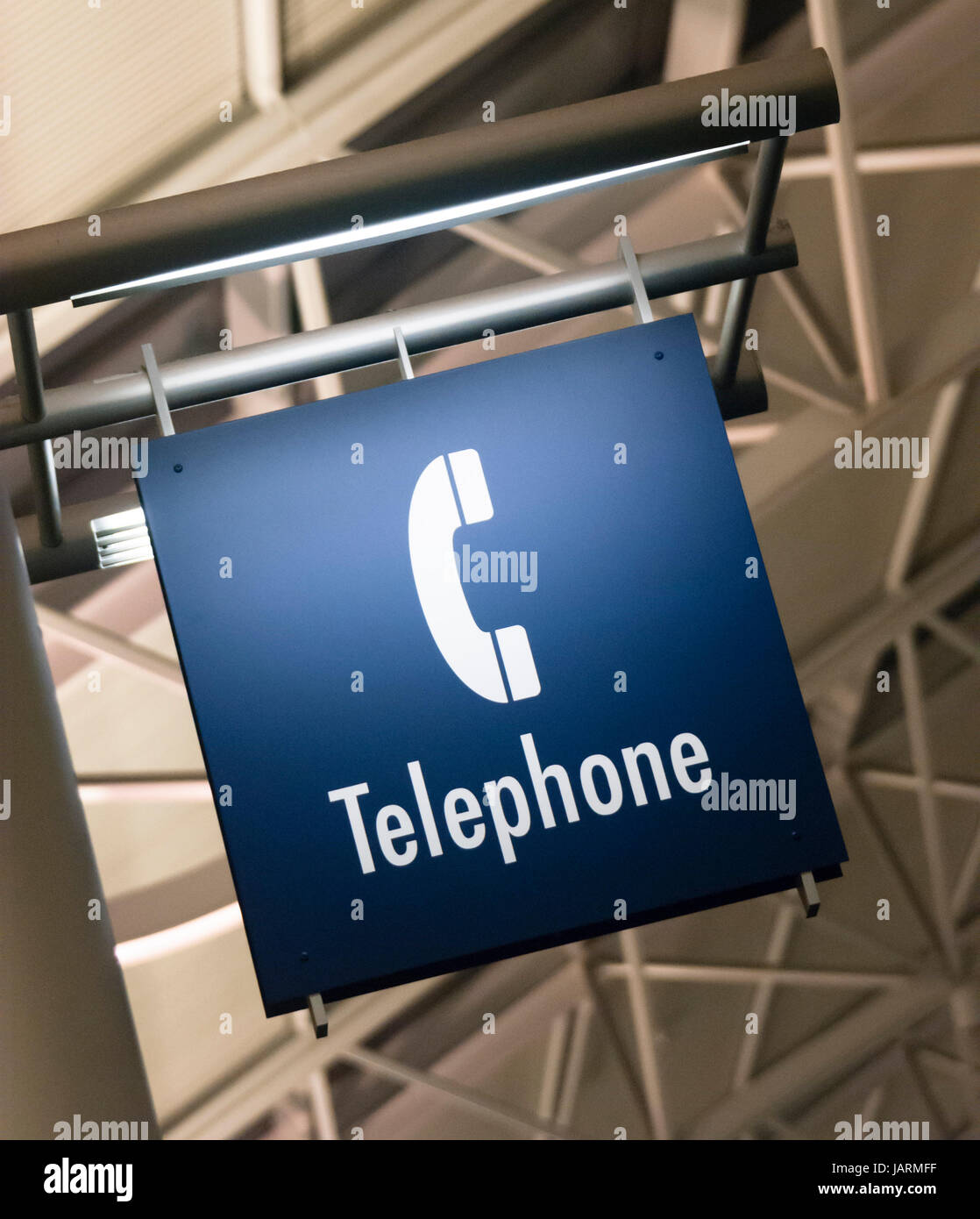 The sign marks area where telephone communication devices phone booths ...