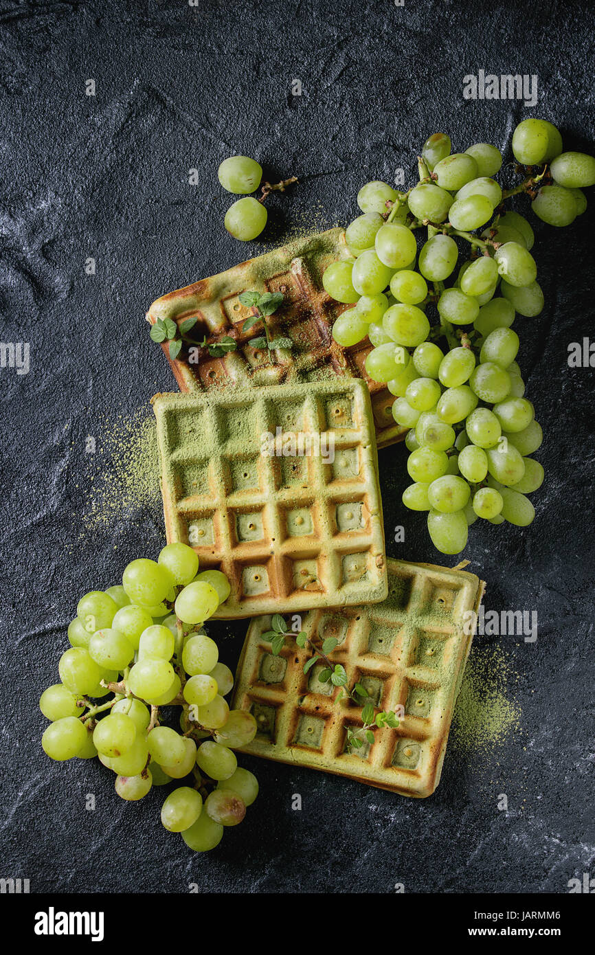 Green waffles with grapes Stock Photo - Alamy