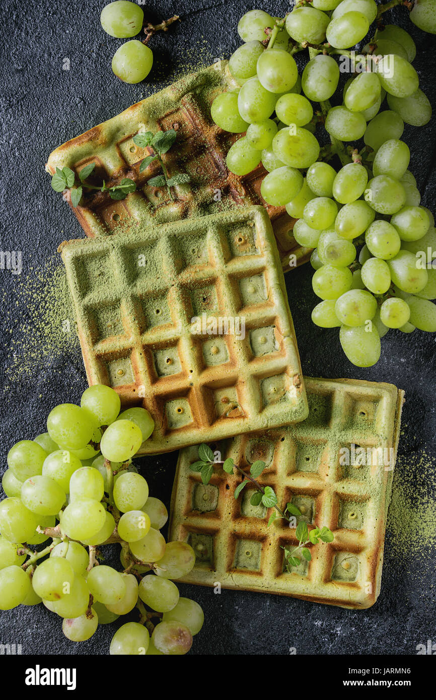 Green waffles with grapes Stock Photo - Alamy