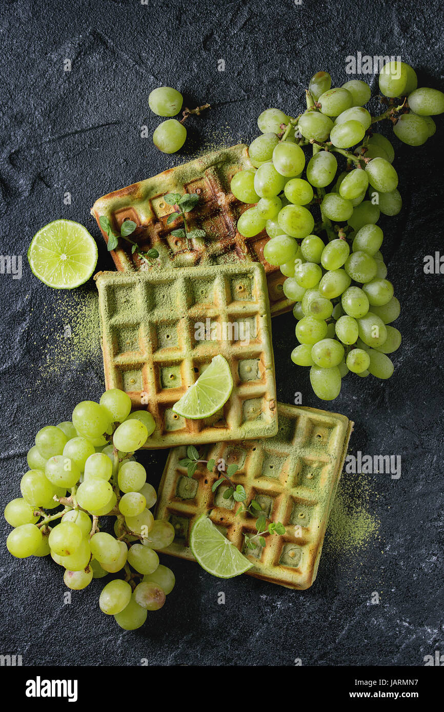 Green waffles with grapes Stock Photo - Alamy