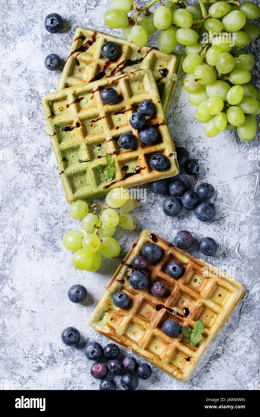Green waffles with grapes Stock Photo - Alamy