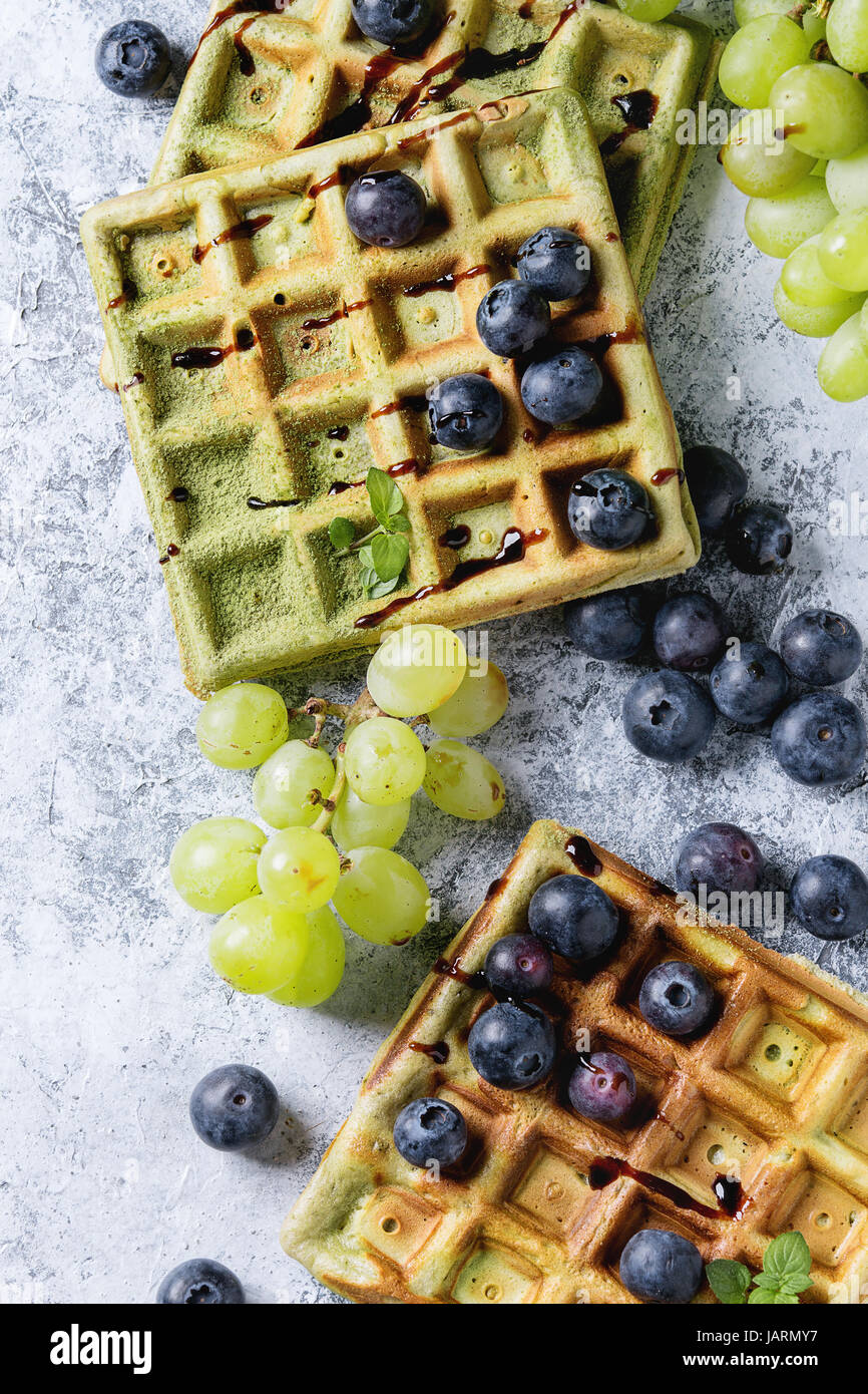 Green waffles with grapes Stock Photo - Alamy