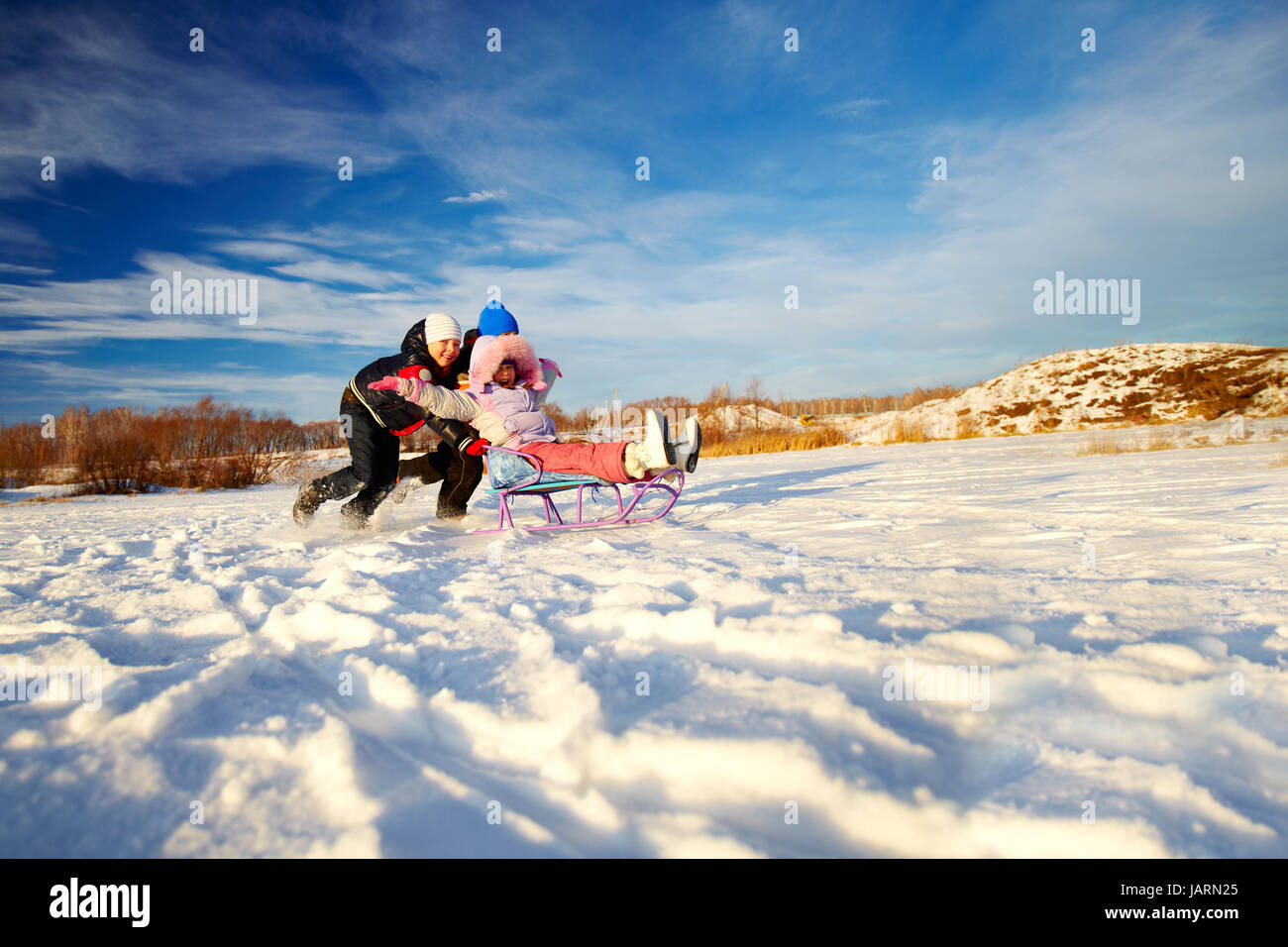 Friendly kids having happy time in winter Stock Photo - Alamy