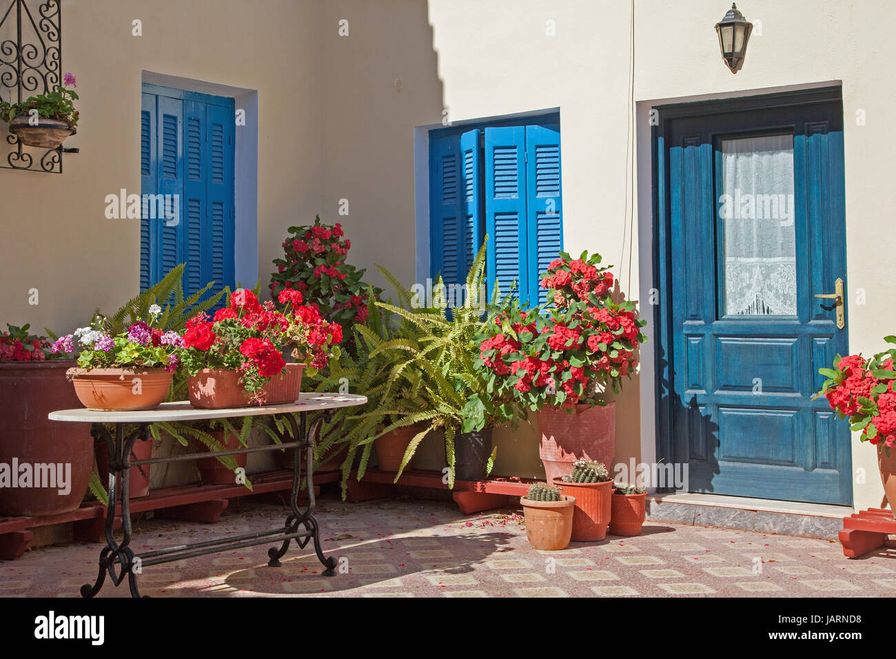 colorful courtyard in a small village on karpathos,greece Stock Photo ...