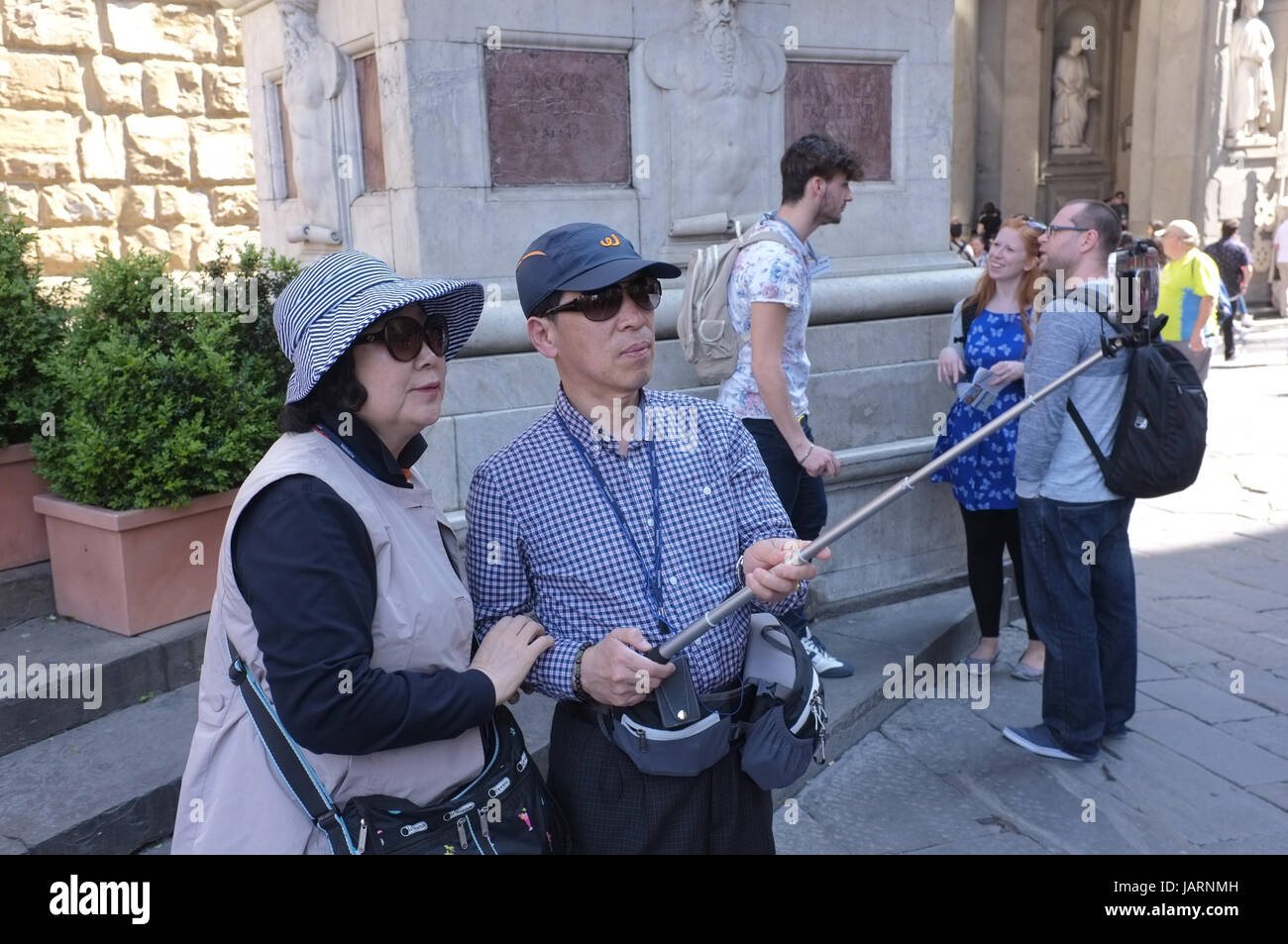 Two Japanese tourists in Florence Stock Photo - Alamy