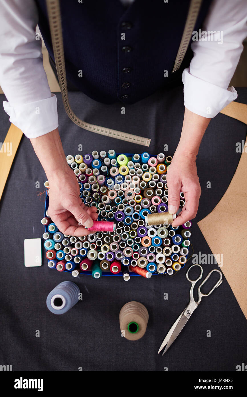 Top View: Tailor Working with Tools Stock Photo - Alamy