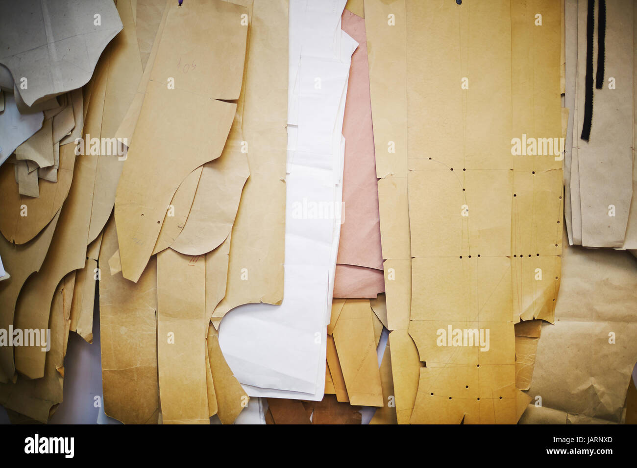 Various Patterns on Wall in Tailoring Studio Stock Photo - Alamy