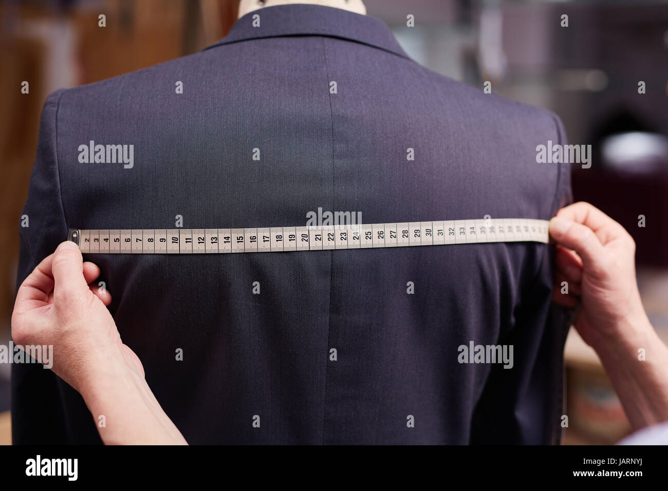 Tailor Making Exclusive Suit in Atelier Stock Photo - Alamy