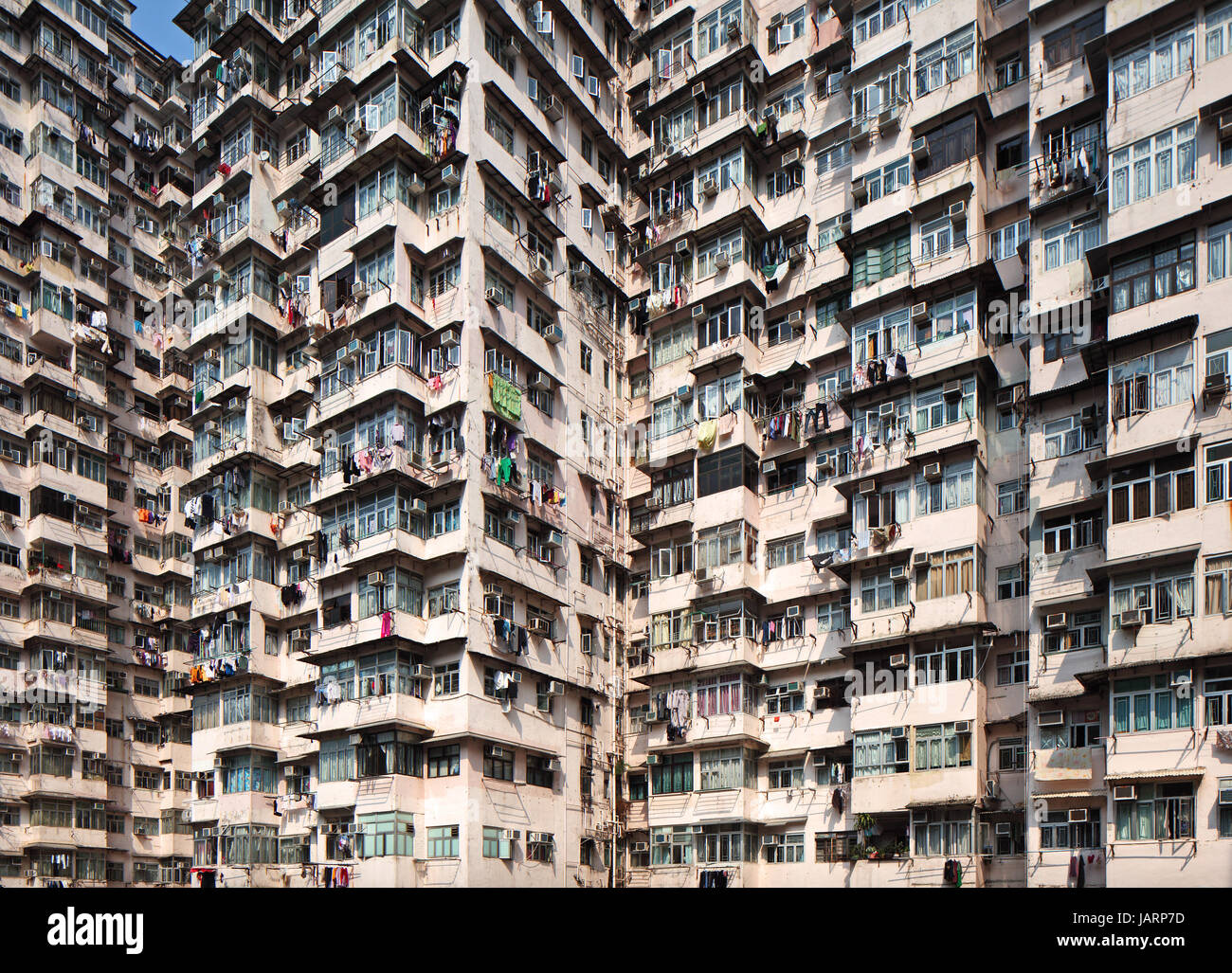 Overcrowded residential building Stock Photo - Alamy