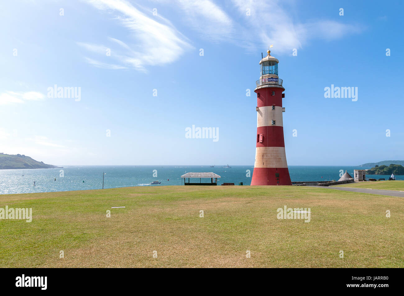 Red and white lighthouse in Plymouth, Great Britain Stock Photo - Alamy