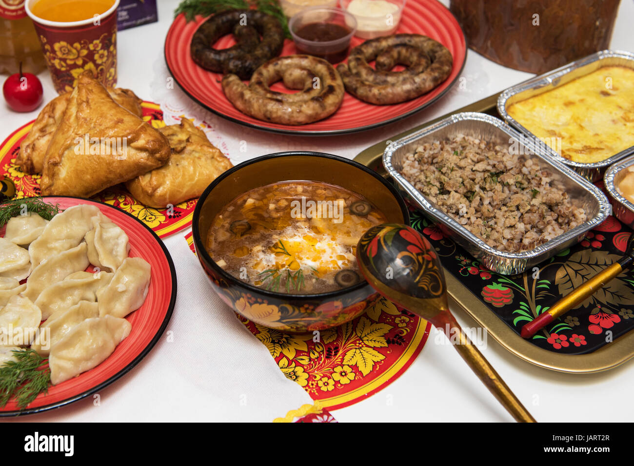 Table with traditional russian food decorated in russian style Stock ...