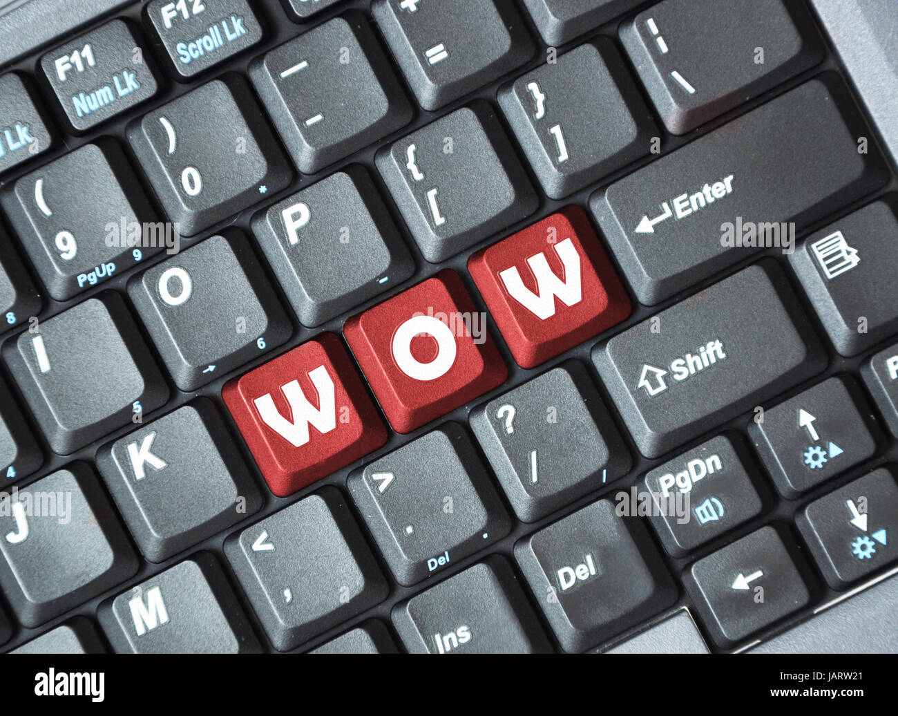 Red wow on keyboard Stock Photo - Alamy
