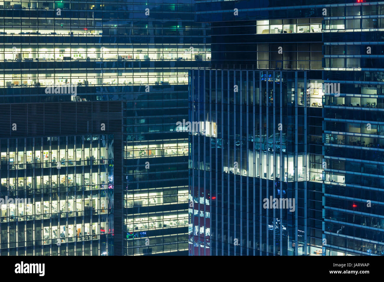 Modern office building at night Stock Photo - Alamy