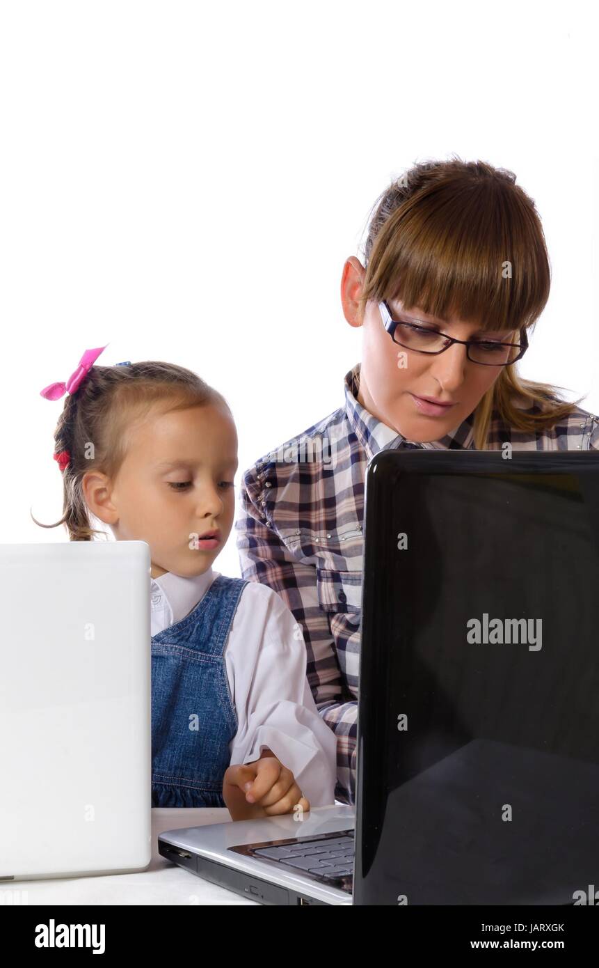 mother and daughter on the computer Stock Photo - Alamy