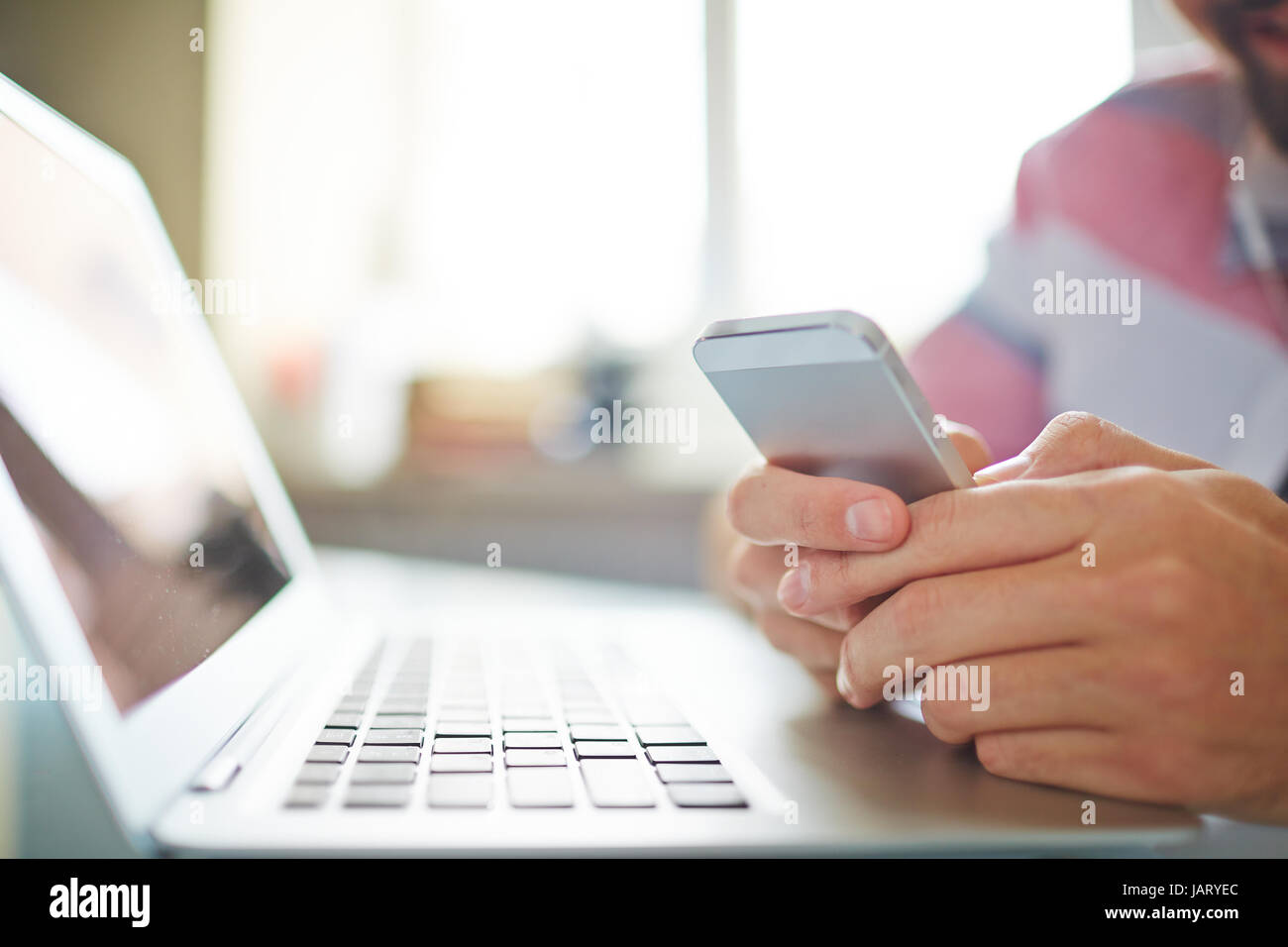 Laptop and smartphone Stock Photo - Alamy