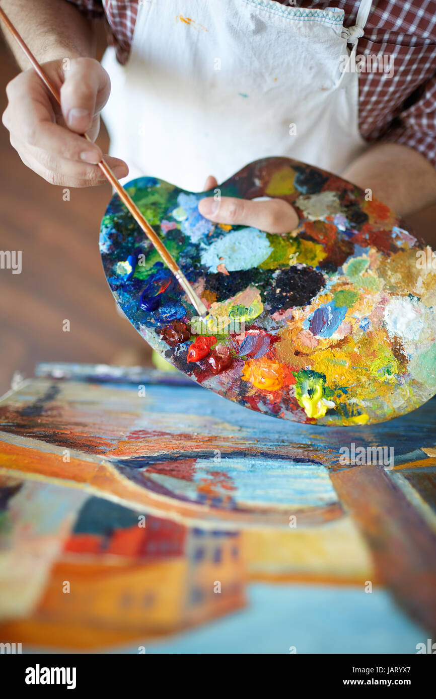 Talented Artist painting Beautiful Picture in Studio Stock Photo - Alamy