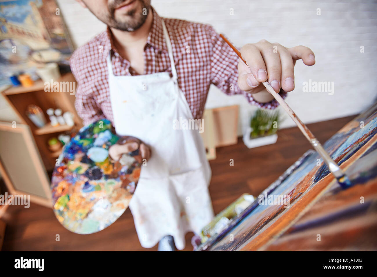 Talented Artist Painting Colorful Picture in Studio Stock Photo - Alamy
