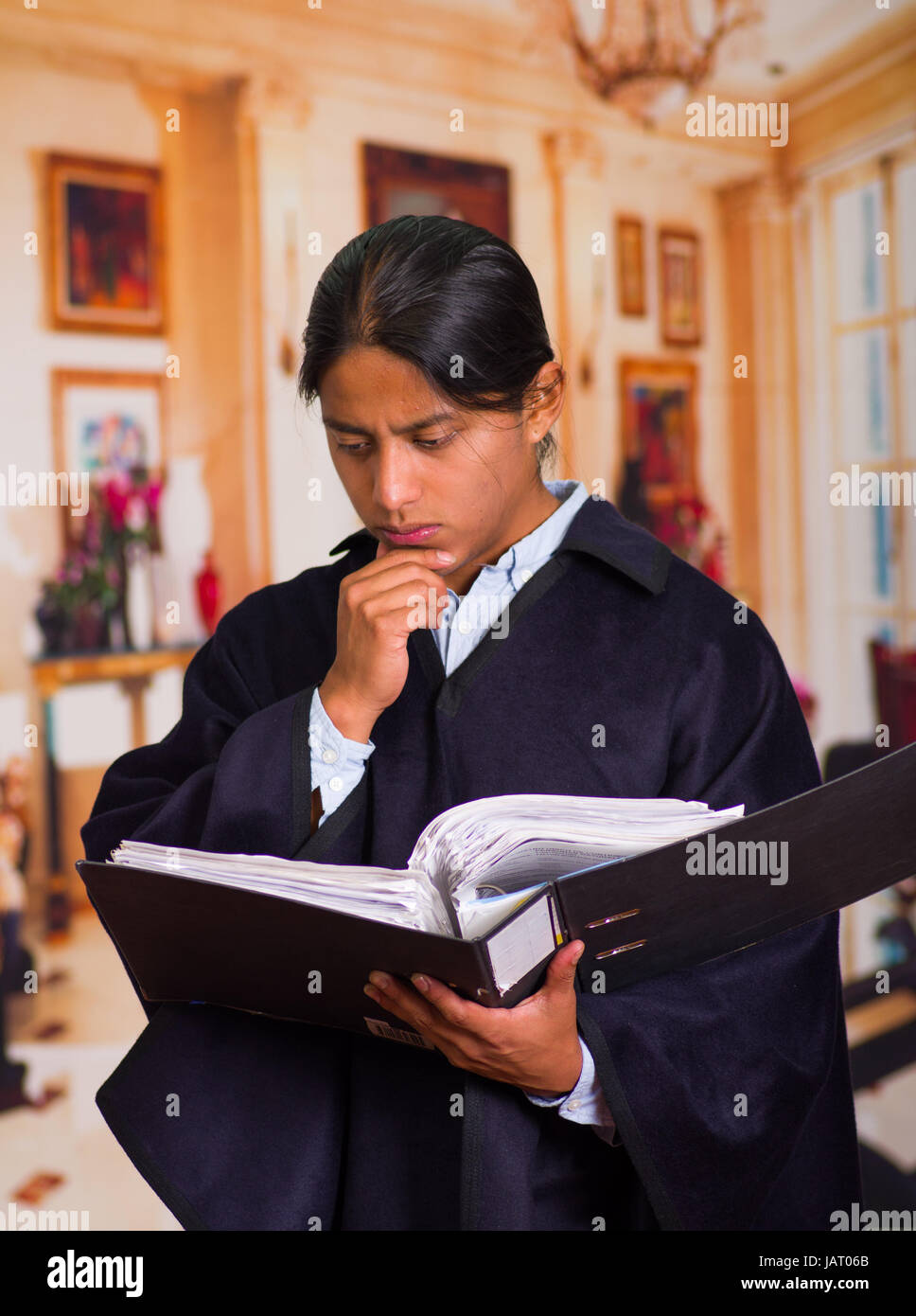 Close up portrait of indigenous latin young man wearing a poncho ...