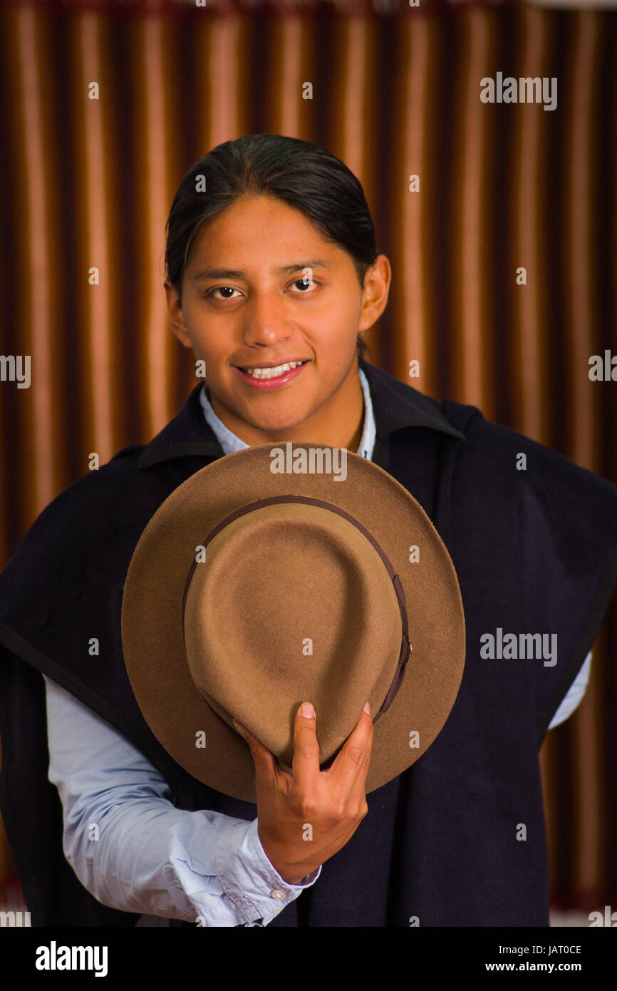 Close up portrait of friendly young indigenous latin american man ...