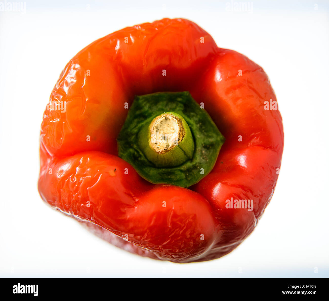 Shiny red bell pepper with green stalk hi-res stock photography and ...