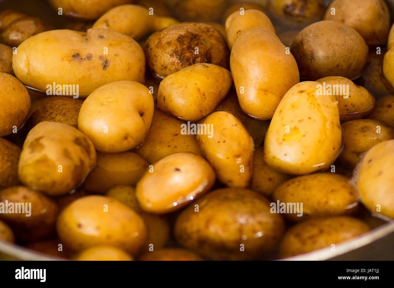 Fresh cooked potatoes on a pan, typical andean food Stock Photo - Alamy