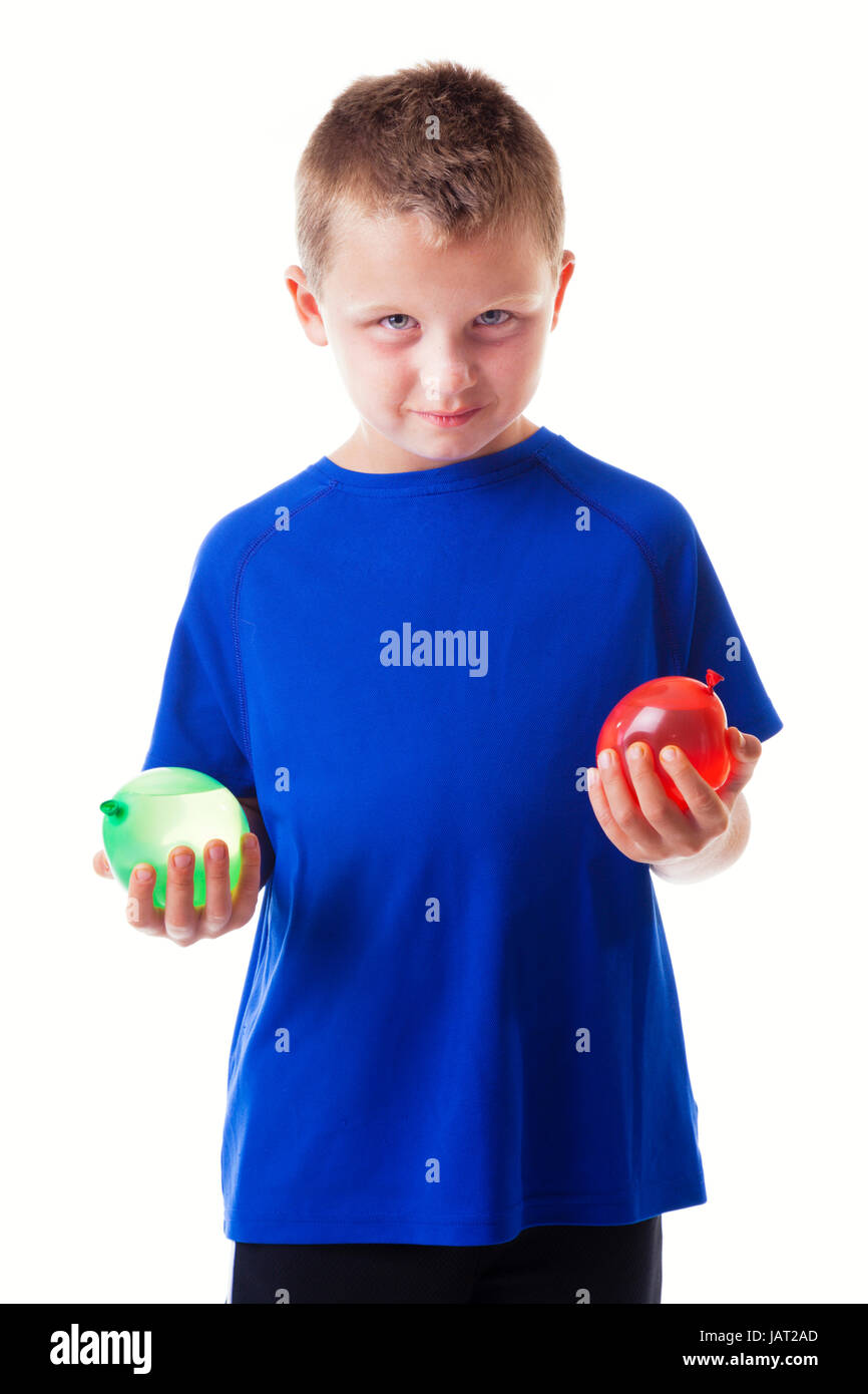 Boy holding water balloons isolated on white background Stock Photo - Alamy
