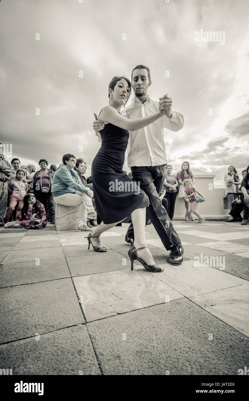 Cuenca, Ecuador - April 22, 2015: Couple performing latin dance styles ...