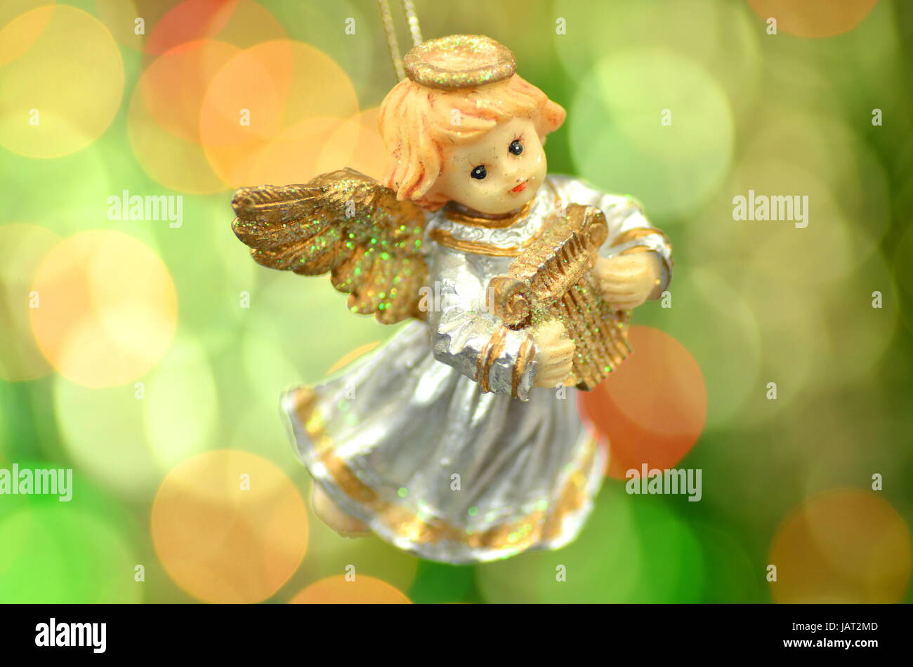Angel play harp hi-res stock photography and images - Alamy