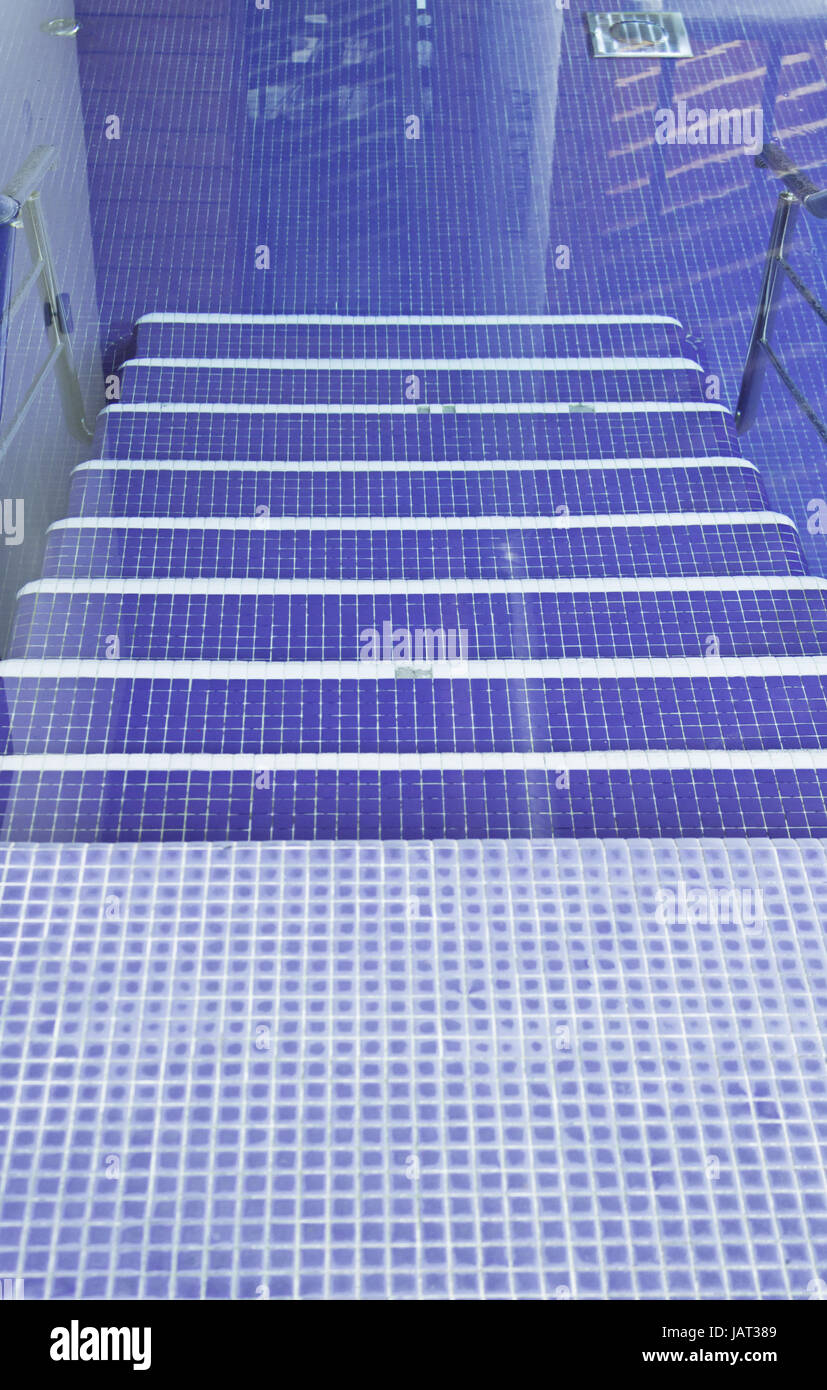 Blue tiles swimming pool stairs hi-res stock photography and images - Alamy