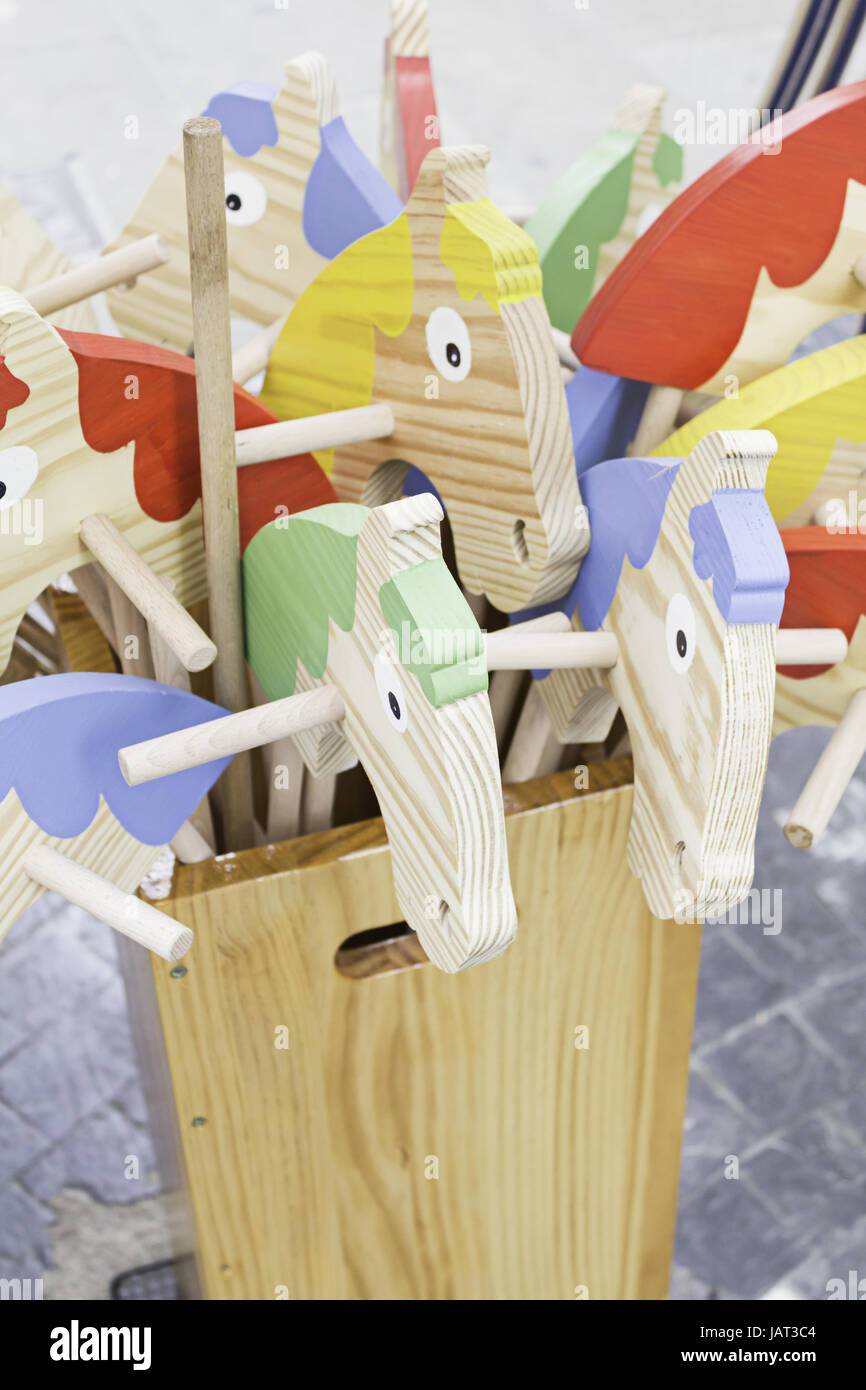 Horses stave handmade crafts in market Stock Photo - Alamy