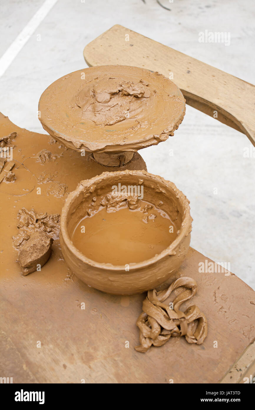Clay and ceramic pottery in position, profession and materials Stock ...