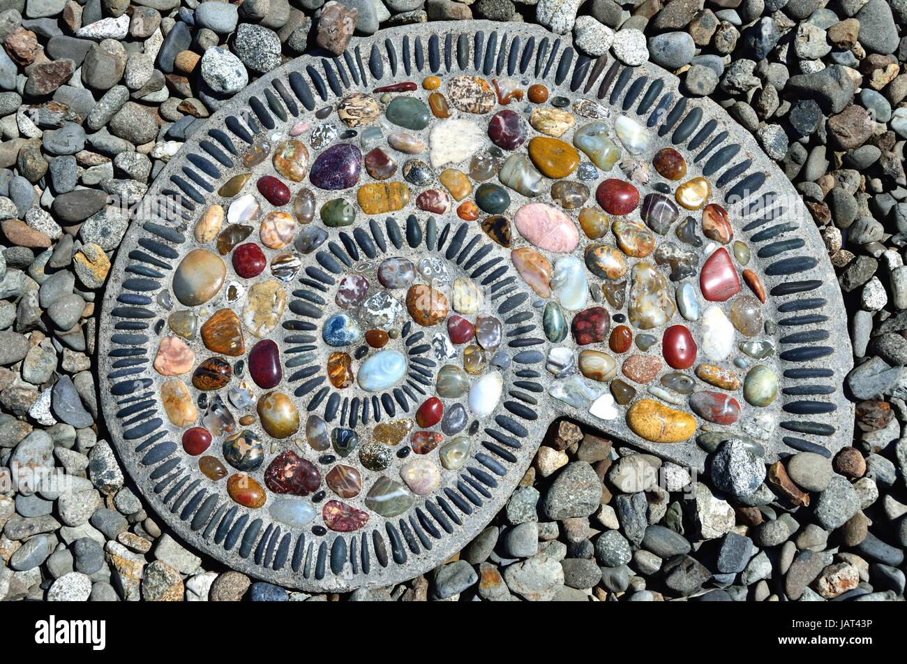 colorful Rocks Swirl Stepping Stone Stock Photo - Alamy