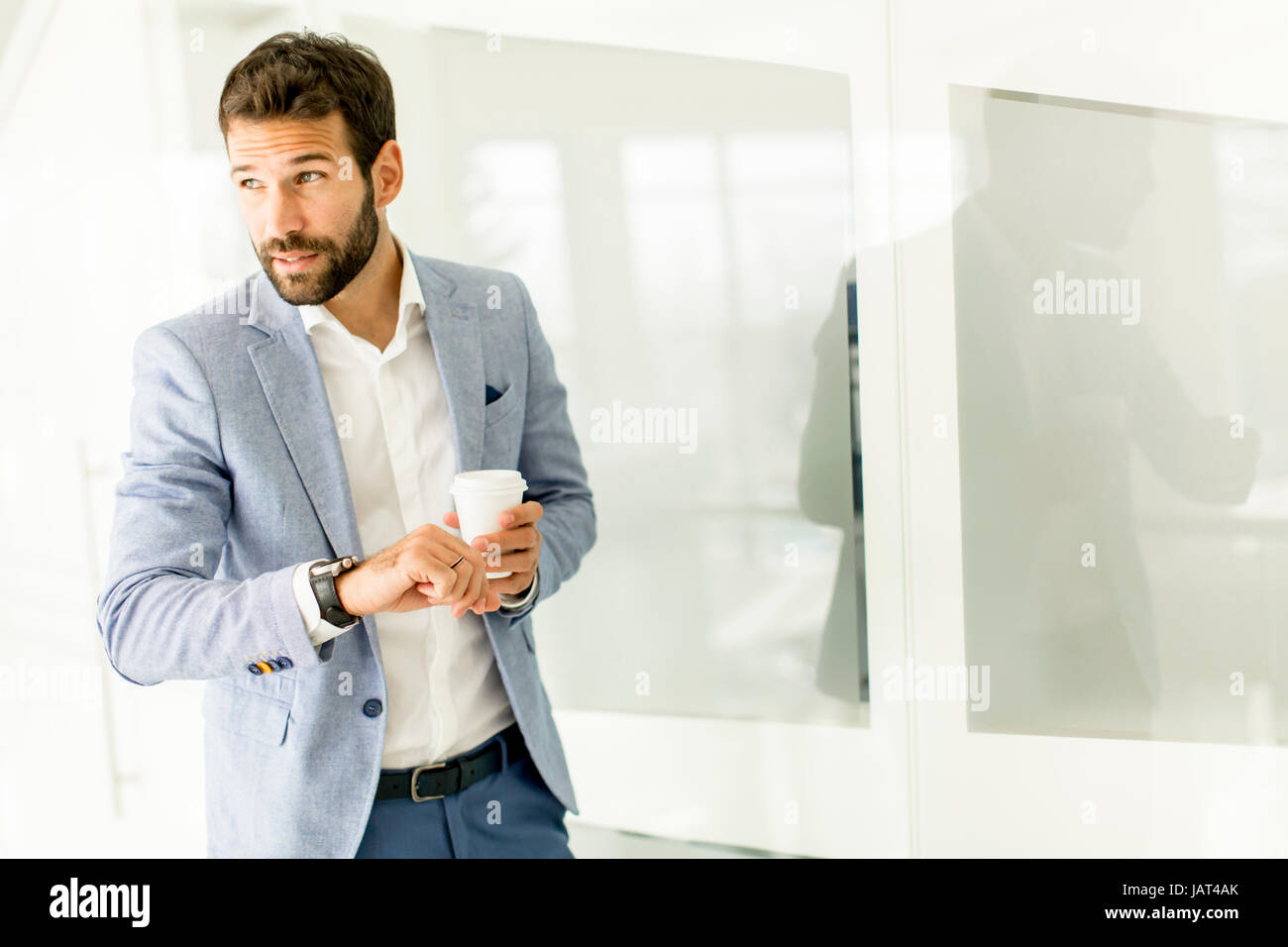 Watching clock office hi-res stock photography and images - Alamy