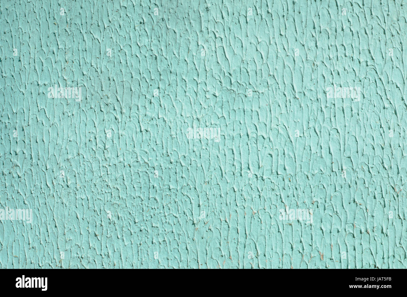 Light green color plaster wall texture. Empty bright mint color plaster ...