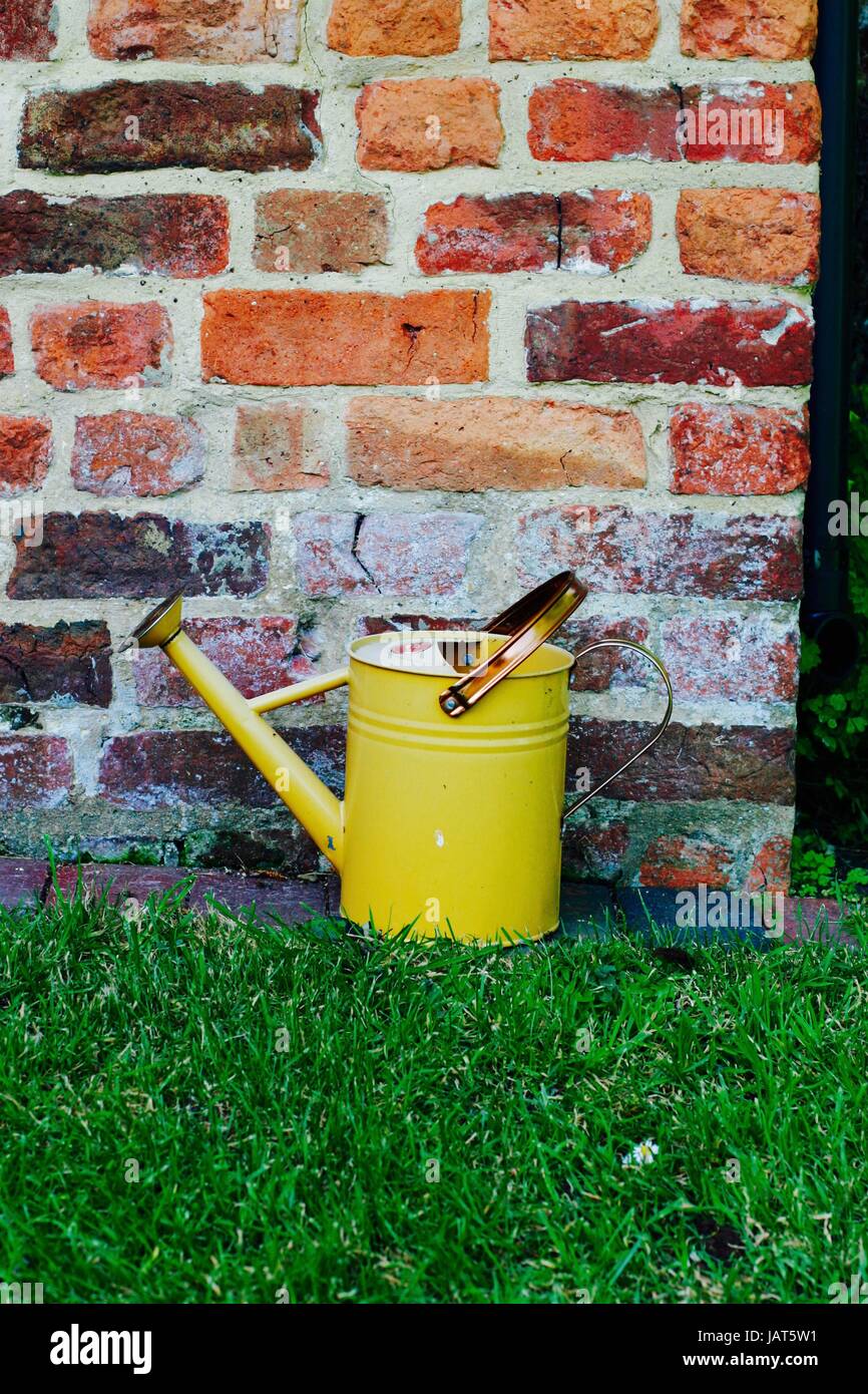 This is a photo of my friend's yellow watering can in her Cotswolds ...