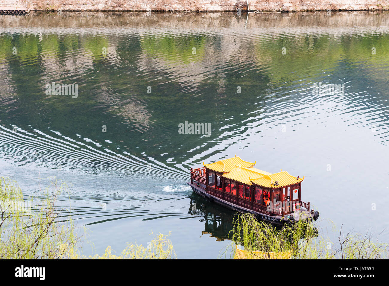 LUOYANG, CHINA - MARCH 20, 2017: ship on Yi river between West and East ...