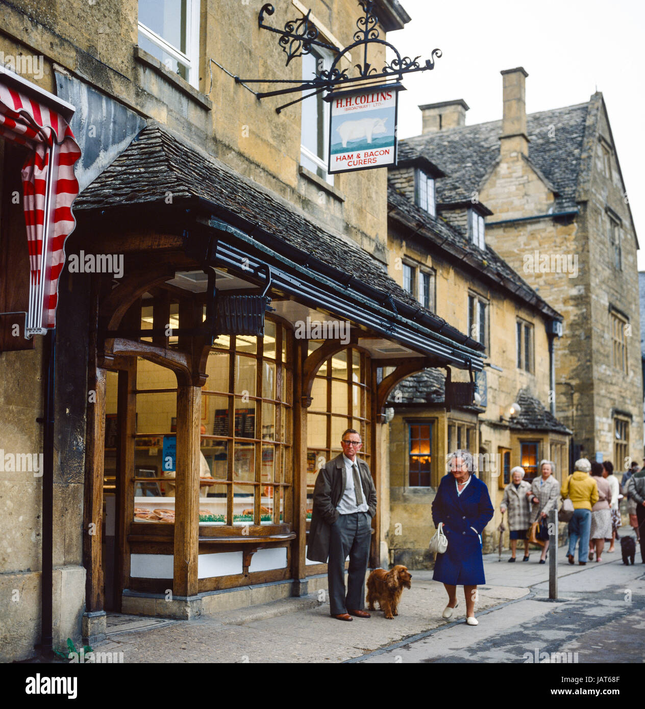Broadway, England, UK - June 1980: Visitors and residents in front of ...