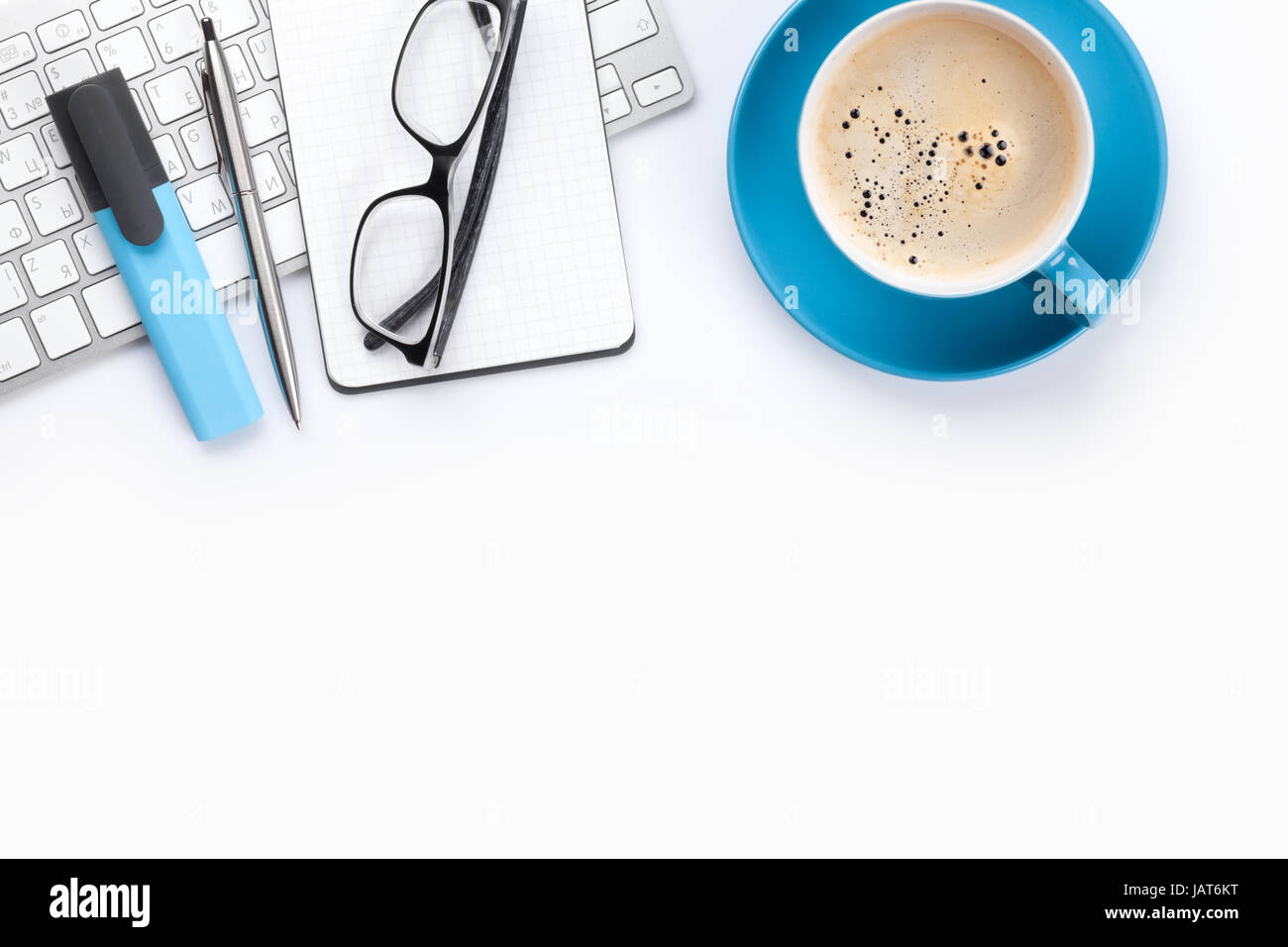 White office desk with coffee, computer and supplies. Tabletop. Top ...