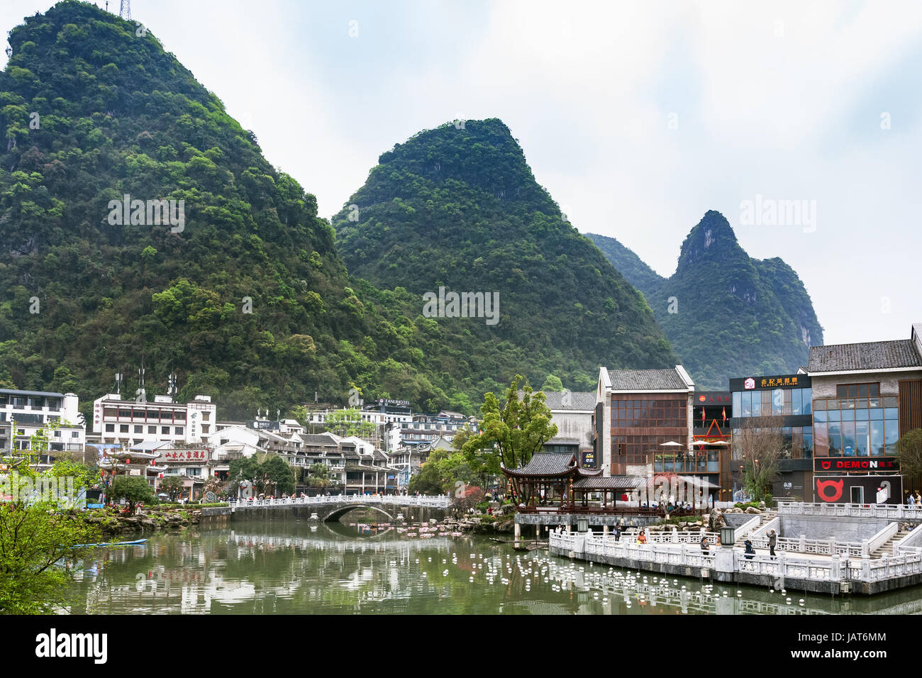 YANGSHUO, CHINA - MARCH 30, 2017: bridge and waterfront in Yangshuo ...
