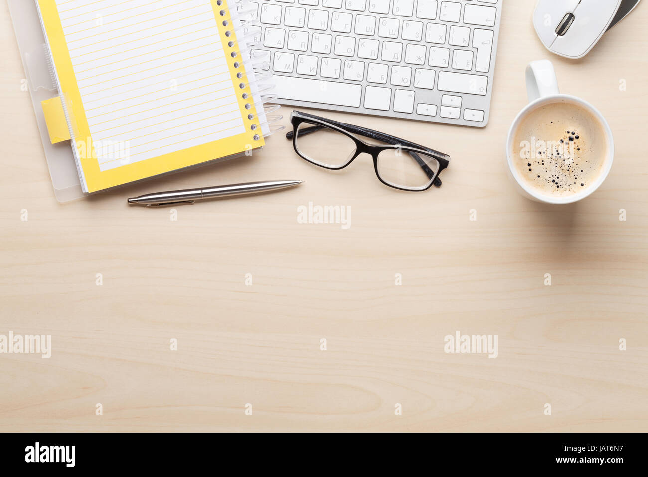 Wooden office desk with computer, coffee and supplies. Tabletop. Top ...