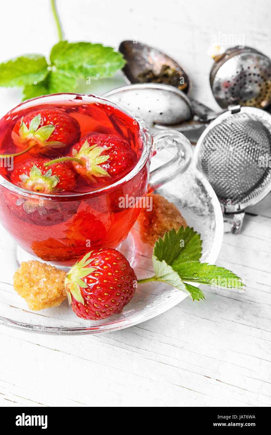 Summer fruit tea with strawberries in glass Stock Photo - Alamy