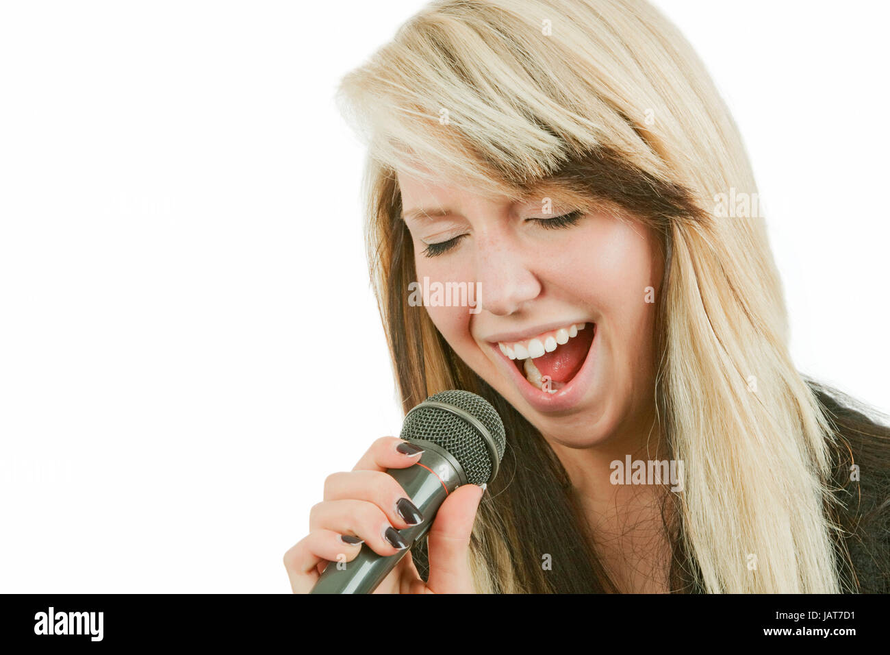 Young woman with microphone isolated on white background Stock Photo ...
