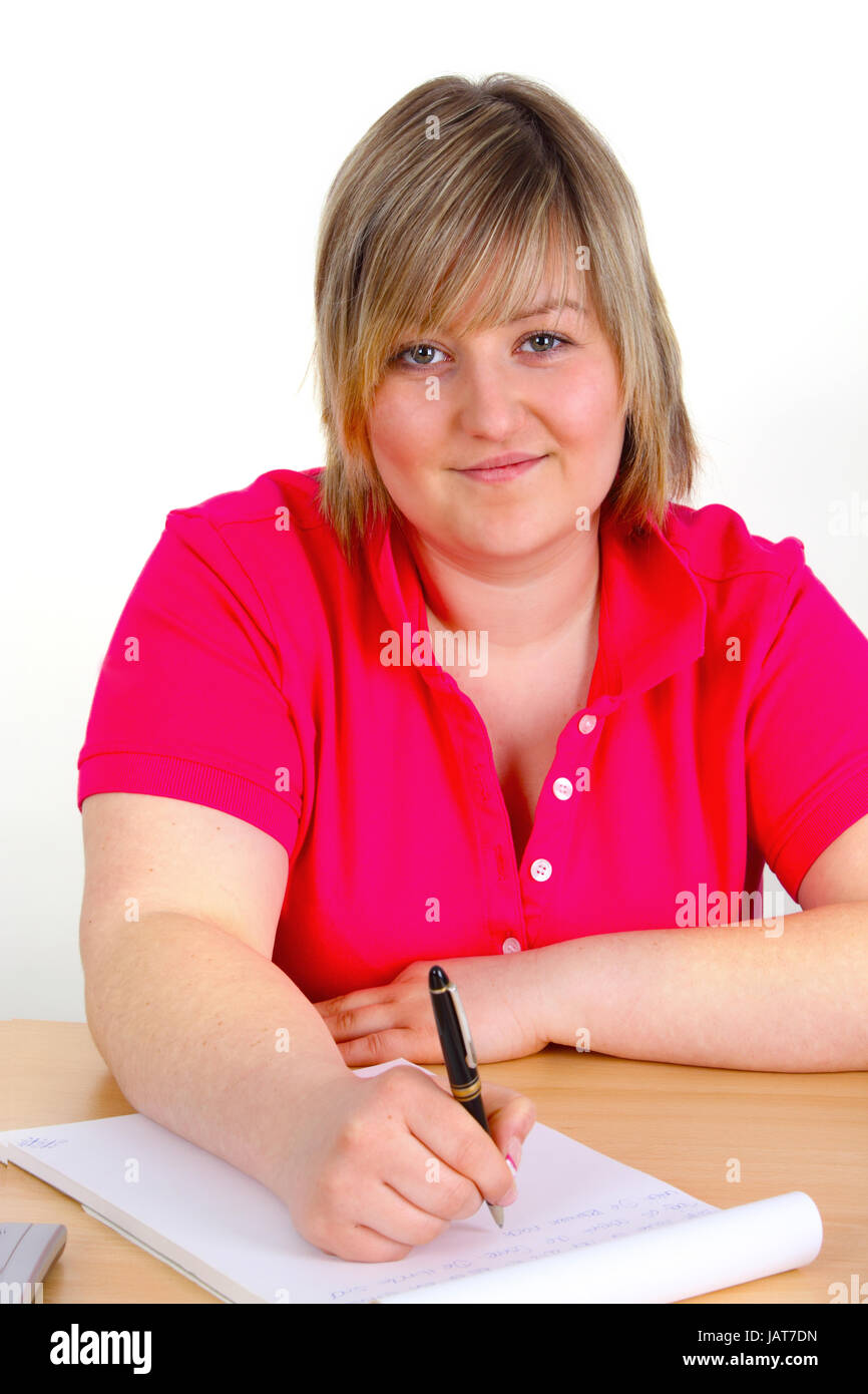 Young female student is writing on white background Stock Photo - Alamy